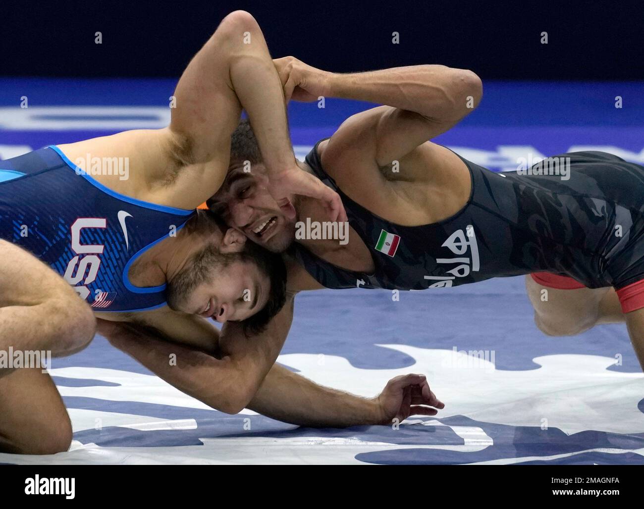 Iran's Rahman Mousa Amouzadkhalili, right, and John Michael ...