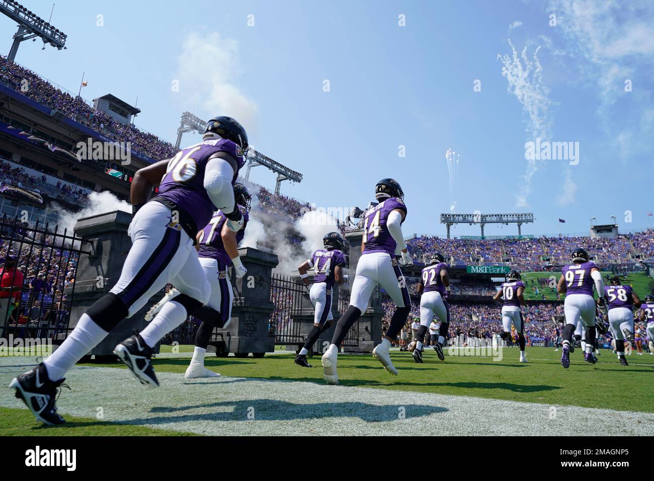 The Baltimore Ravens team enters the field during before an NFL ...