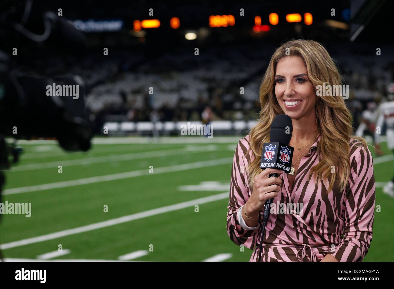 Sara Walsh of the NFL network works before an NFL football game between ...