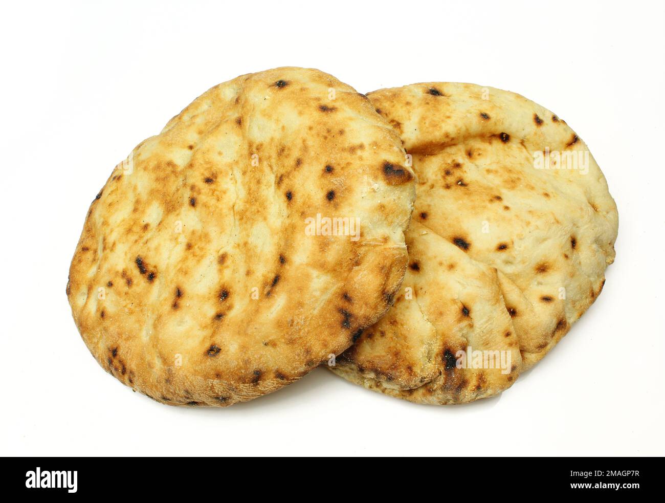 Two flatbread balkan style lepinas isolated on white background. Rustic ...