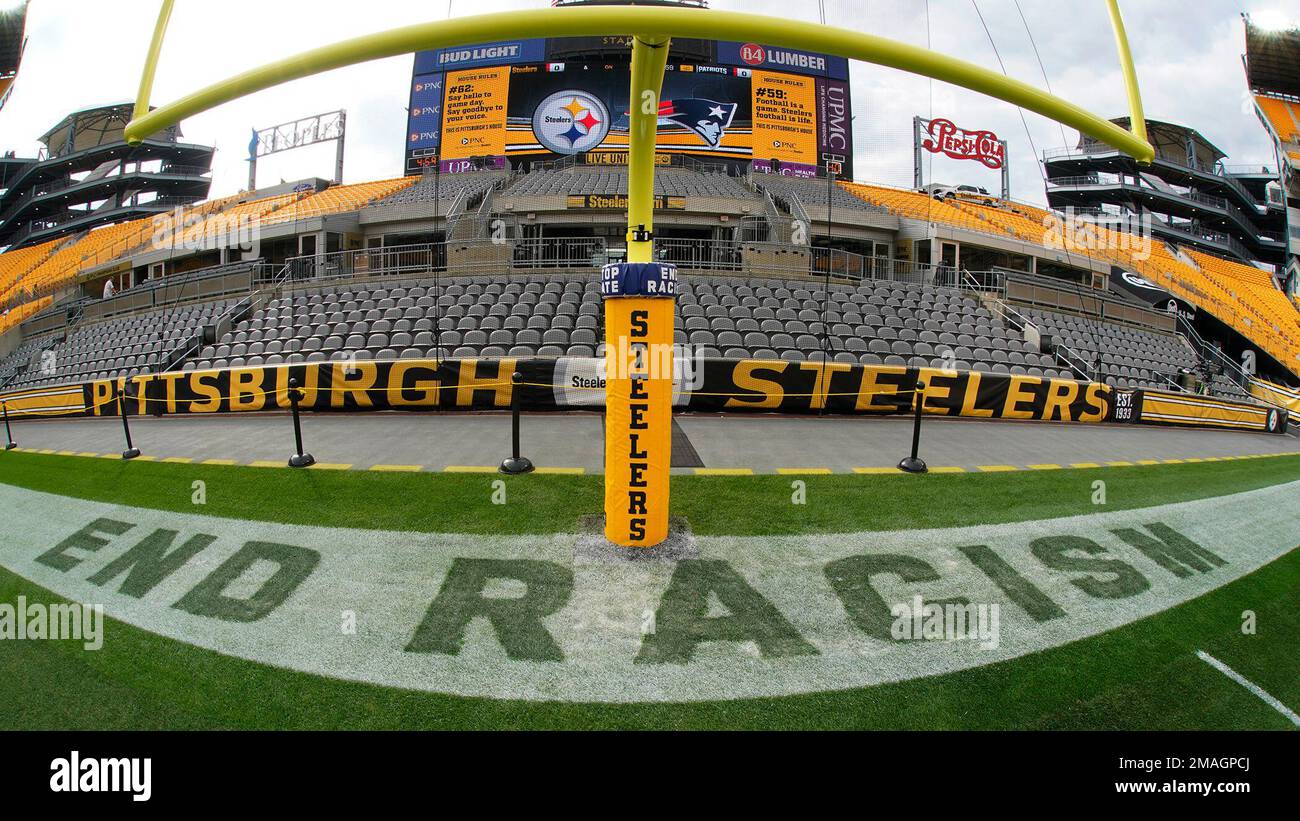 This is a goalpost and message painted in the end zone at Acrisure ...