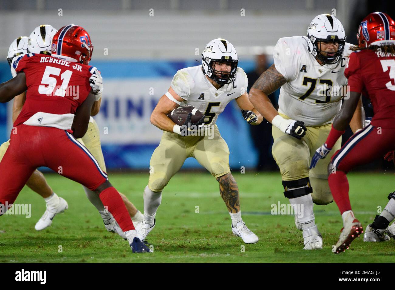 UCF running back Isaiah Bowser (5) runs with the ball during an NCAA ...