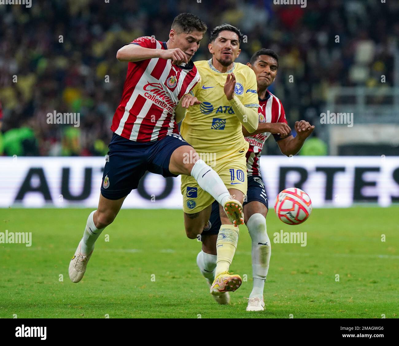 Guadalajara's Luis Olivas, left, and Gilberto Sepulveda, right ...