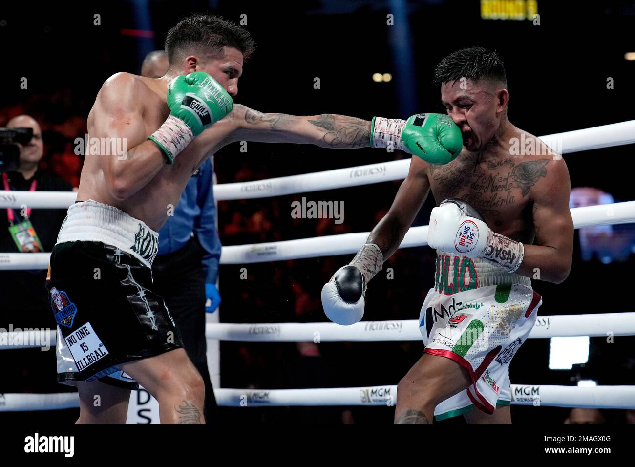 Jesse Rodriguez, left, fights Israel Gonzalez in a super flyweight ...