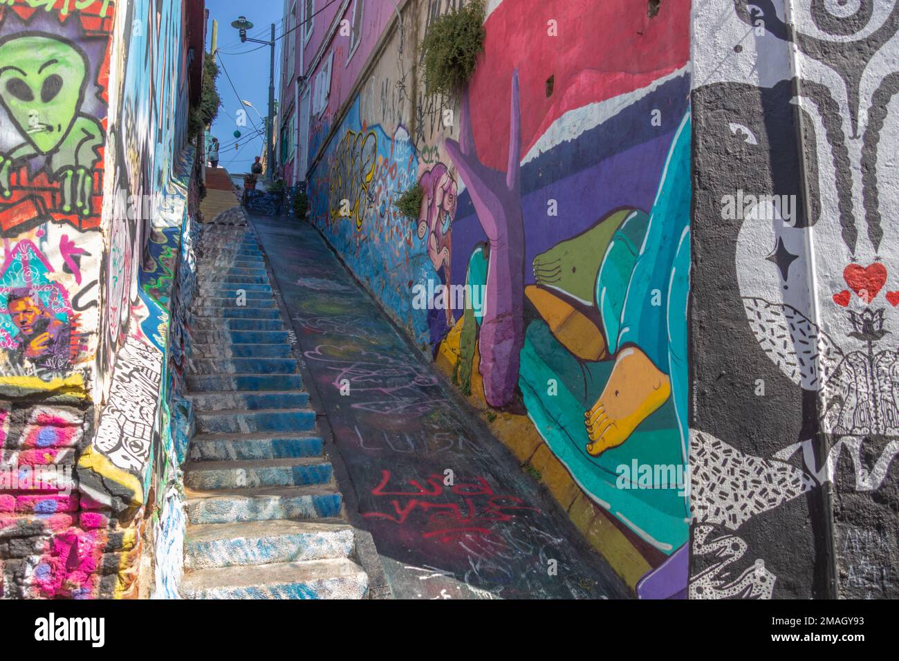 Valparaiso, Chile - Dec 5, 2022: Stairs with graffiti on a steep street ...