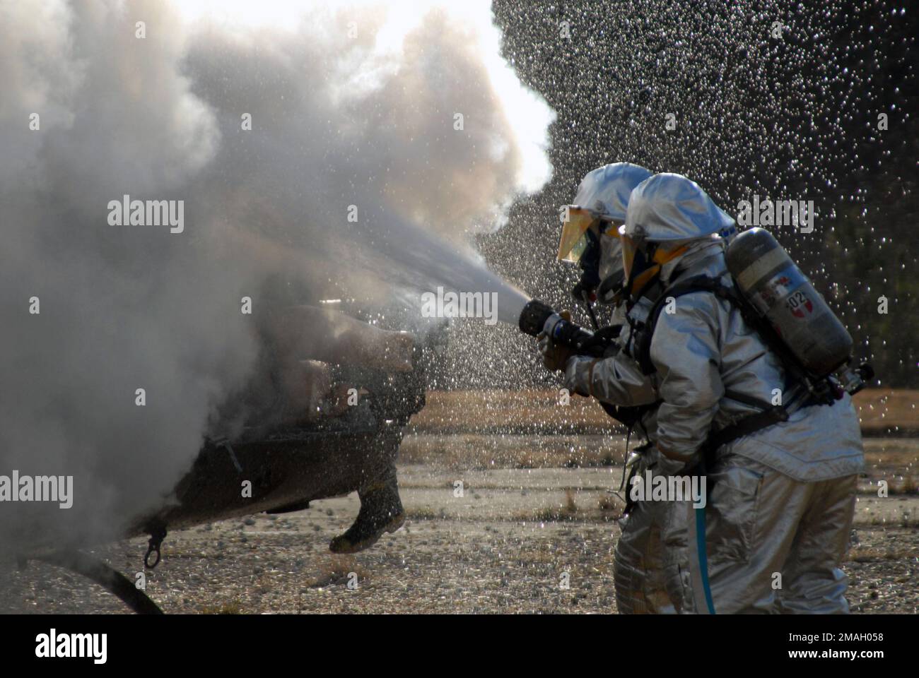 Pouring diesel fuel inside of a uh 1 huey helicopter hi-res stock ...