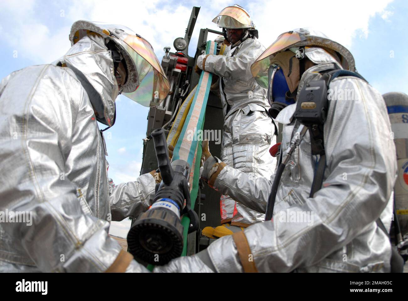 Pouring diesel fuel inside of a uh 1 huey helicopter hi-res stock ...