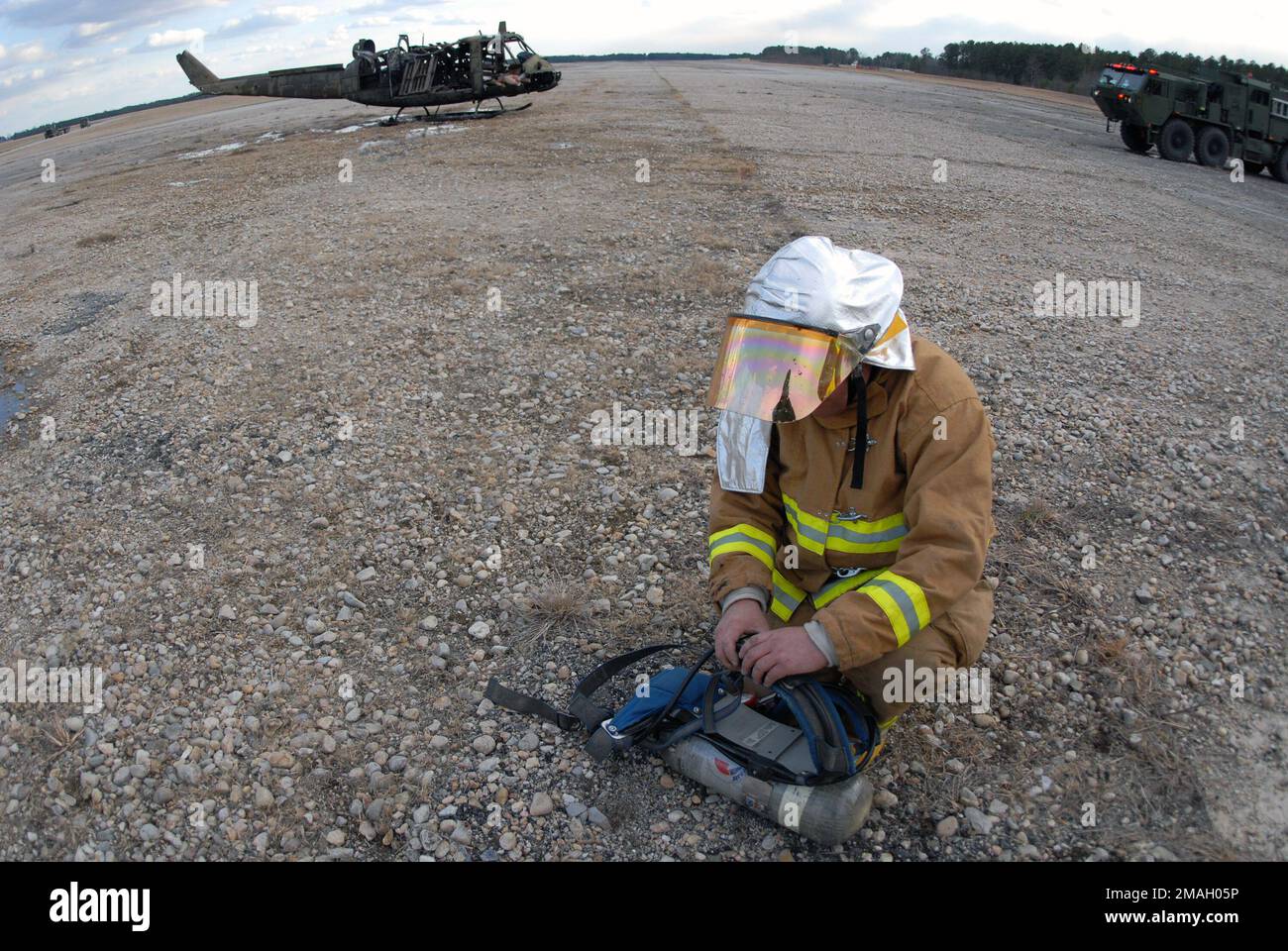 Pouring diesel fuel inside of a uh 1 huey helicopter hi-res stock ...
