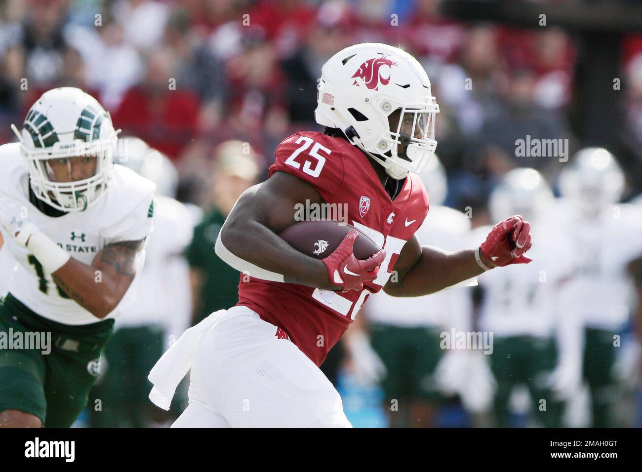 Washington State running back Nakia Watson carries the ball during the ...
