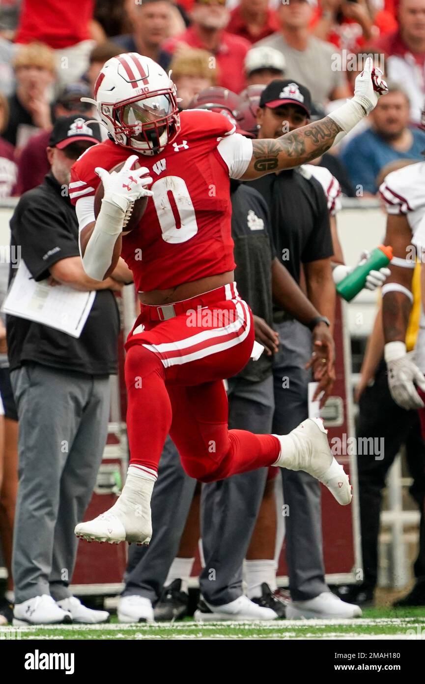 Wisconsin's Braelon Allen (0) runs during the first half of an NCAA ...