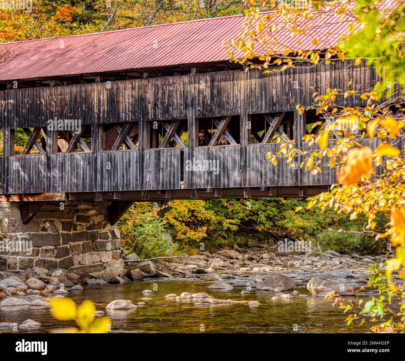 A covered bridge and fall nature in New Hampshire, USA Stock Photo - Alamy