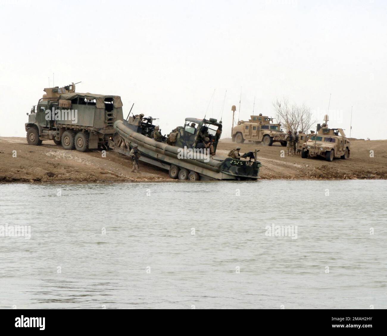 070315-M-6500K-015. [Complete] Scene Caption: March 5, 2007, Riverine ...