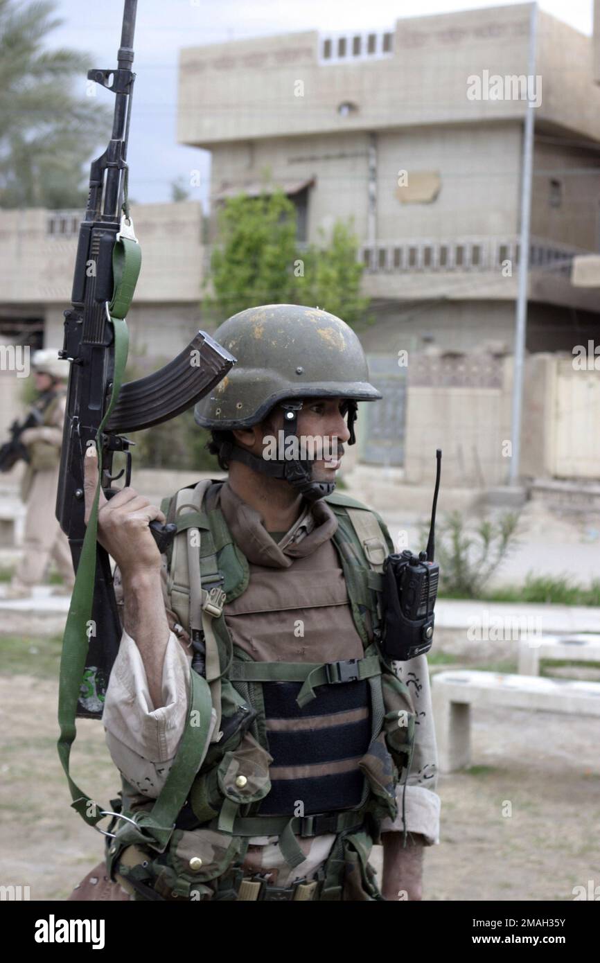 070317-M-2819S-019. [Complete] Scene Caption: A Soldier with the Iraqi ...