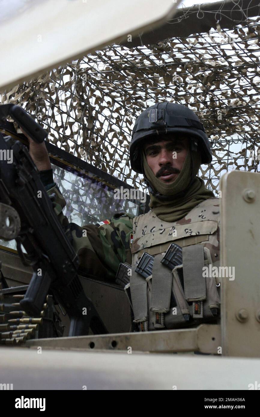 070317-M-2819S-020. [Complete] Scene Caption: A Soldier with the Iraqi ...