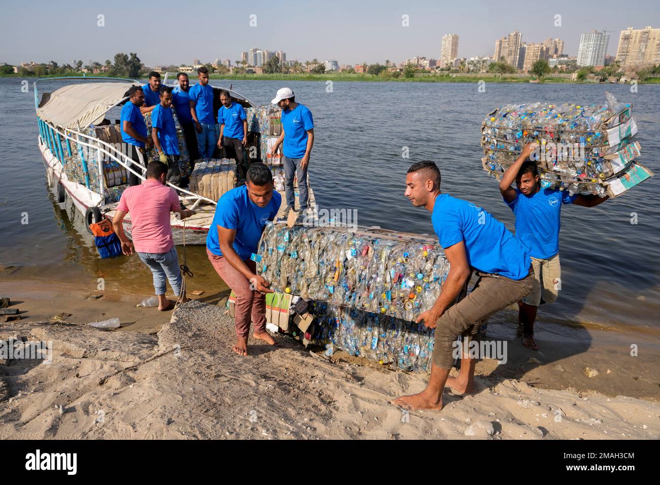 In this Thursday, Sept. 15, 2022 picture, "Verynile" initiative workers ...