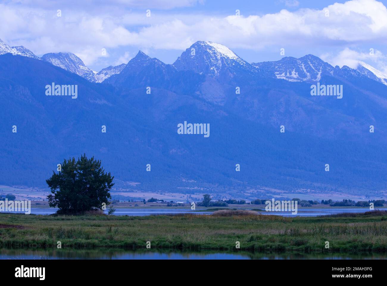Beautiful view of snow capped Mission Mountains of Rocky Mountains ...