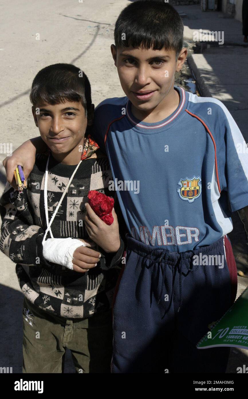 070318-M-2819S-019. [Complete] Scene Caption: Iraqi children smile ...