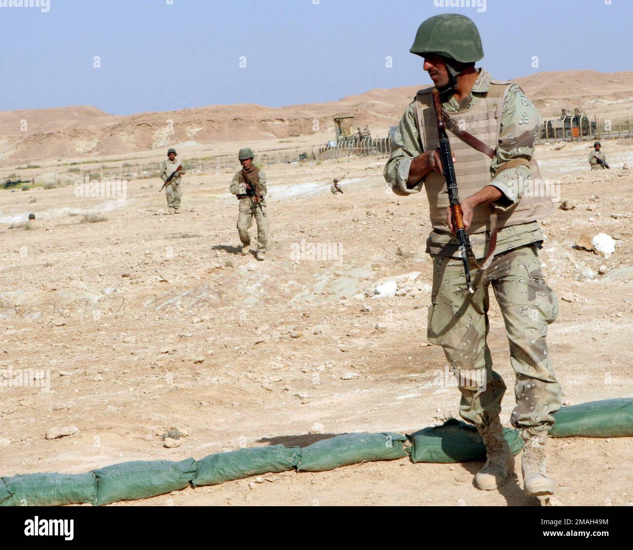 070320-M-7404B-027. [Complete] Scene Caption: Iraqi Army Soldiers in ...