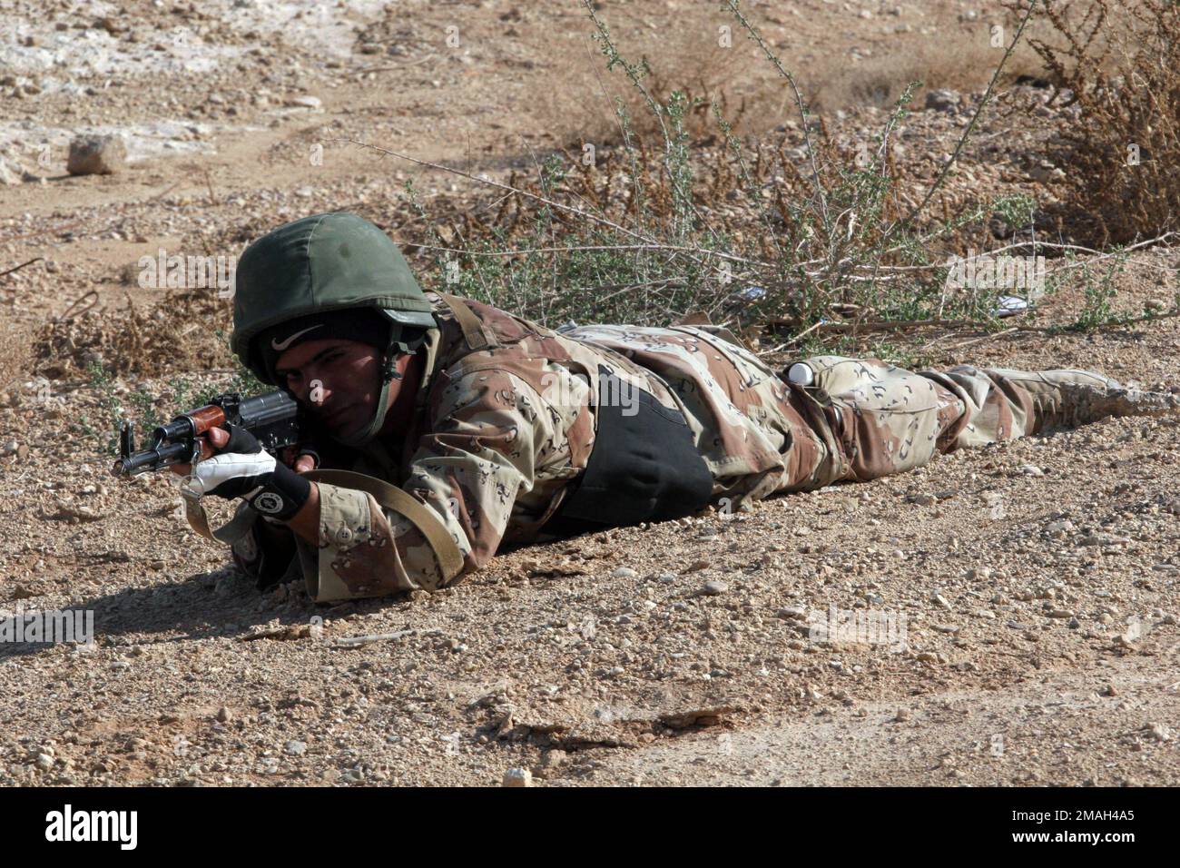 070320-M-7404B-020. [Complete] Scene Caption: An Iraqi Army Soldier in ...