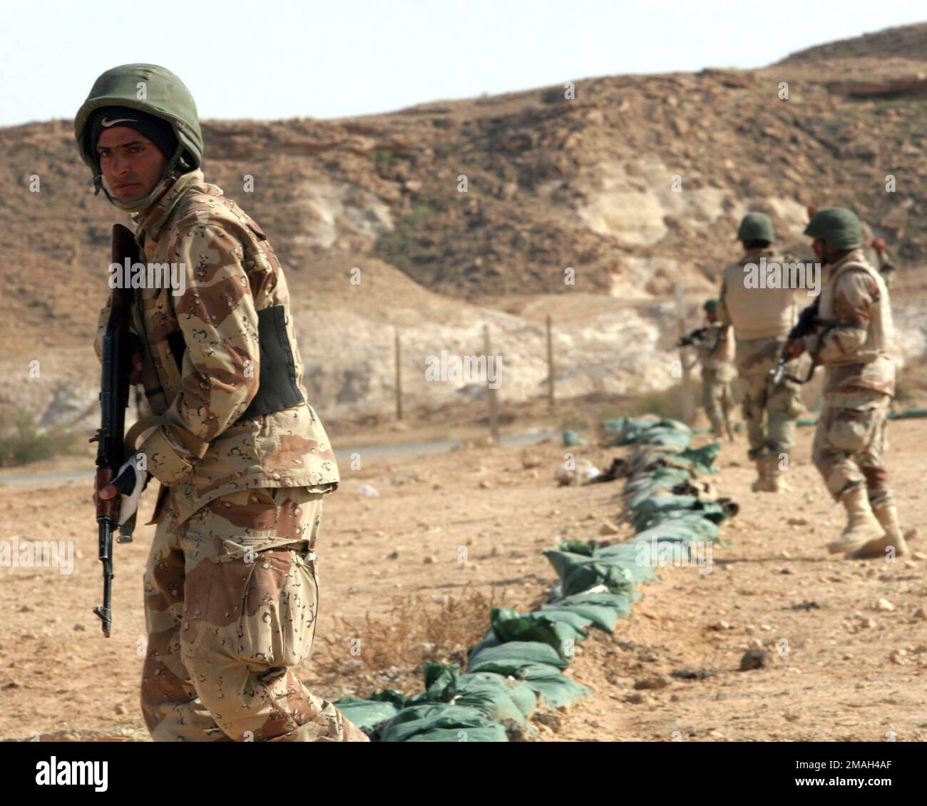 070320-M-7404B-025. [Complete] Scene Caption: Iraqi Army Soldiers in ...