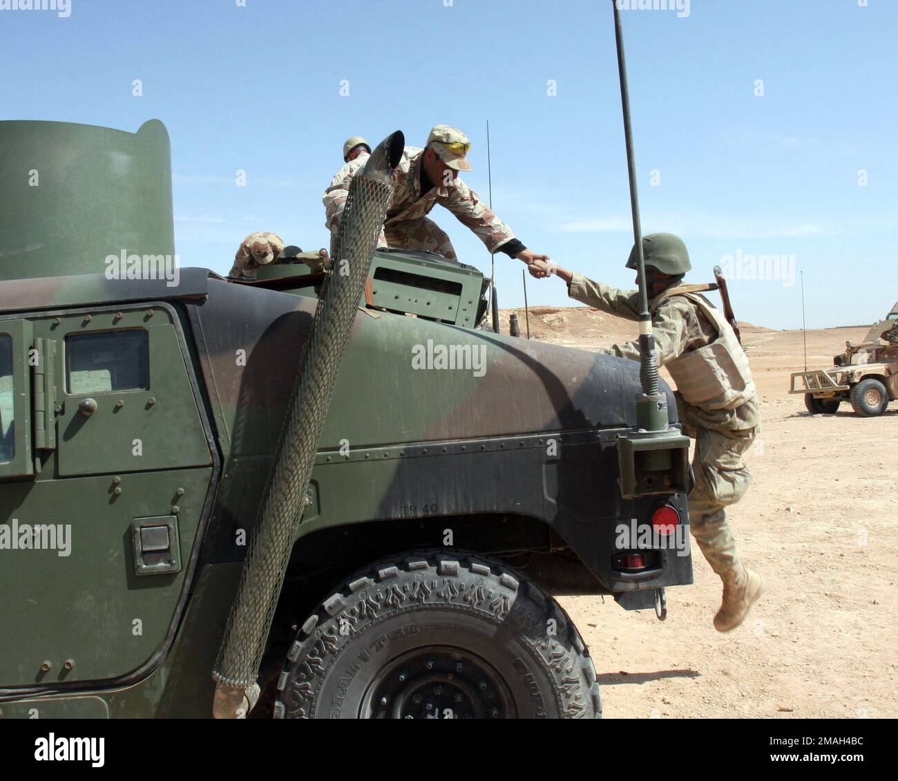 070319-M-7404B-004. [Complete] Scene Caption: An Instructor with the ...