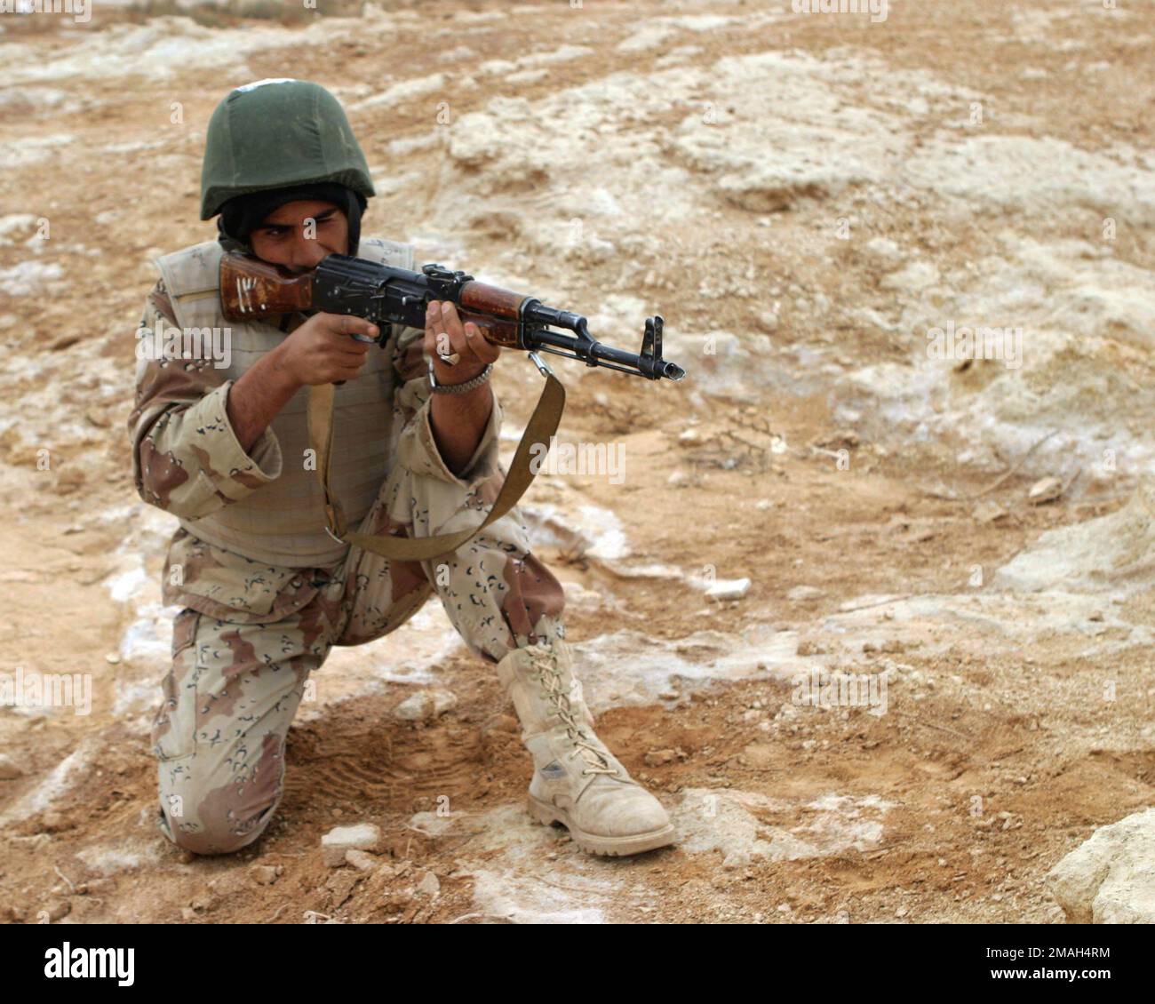 070324-M-2166H-011. [Complete] Scene Caption: An Iraqi Army Soldier in ...
