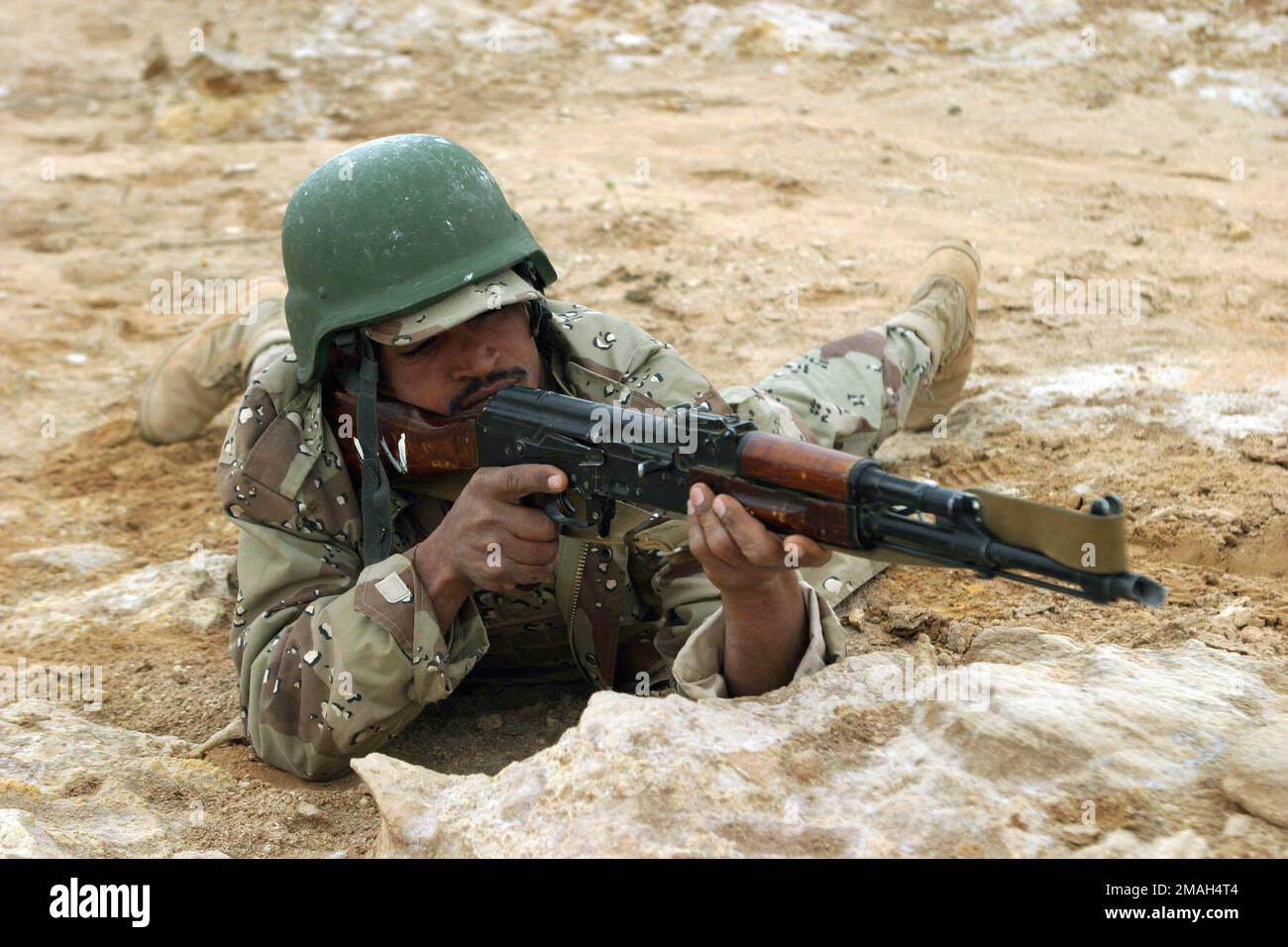 070324-M-2166H-010. [Complete] Scene Caption: An Iraqi Army Soldier in ...