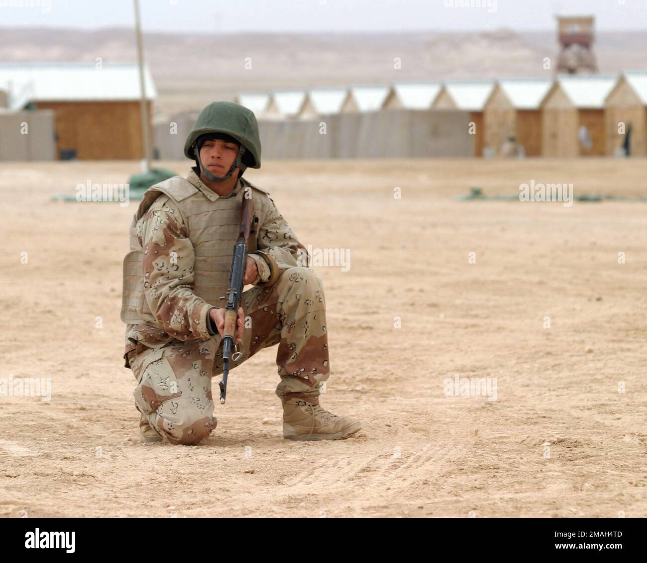 070324-M-2166H-018. [Complete] Scene Caption: An Iraqi Army Soldier in ...
