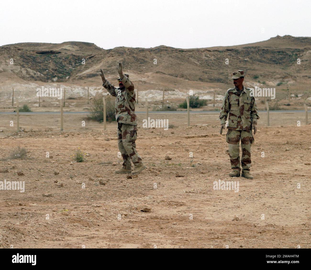 070324-M-2166H-004. [Complete] Scene Caption: Iraqi Army instructors at ...