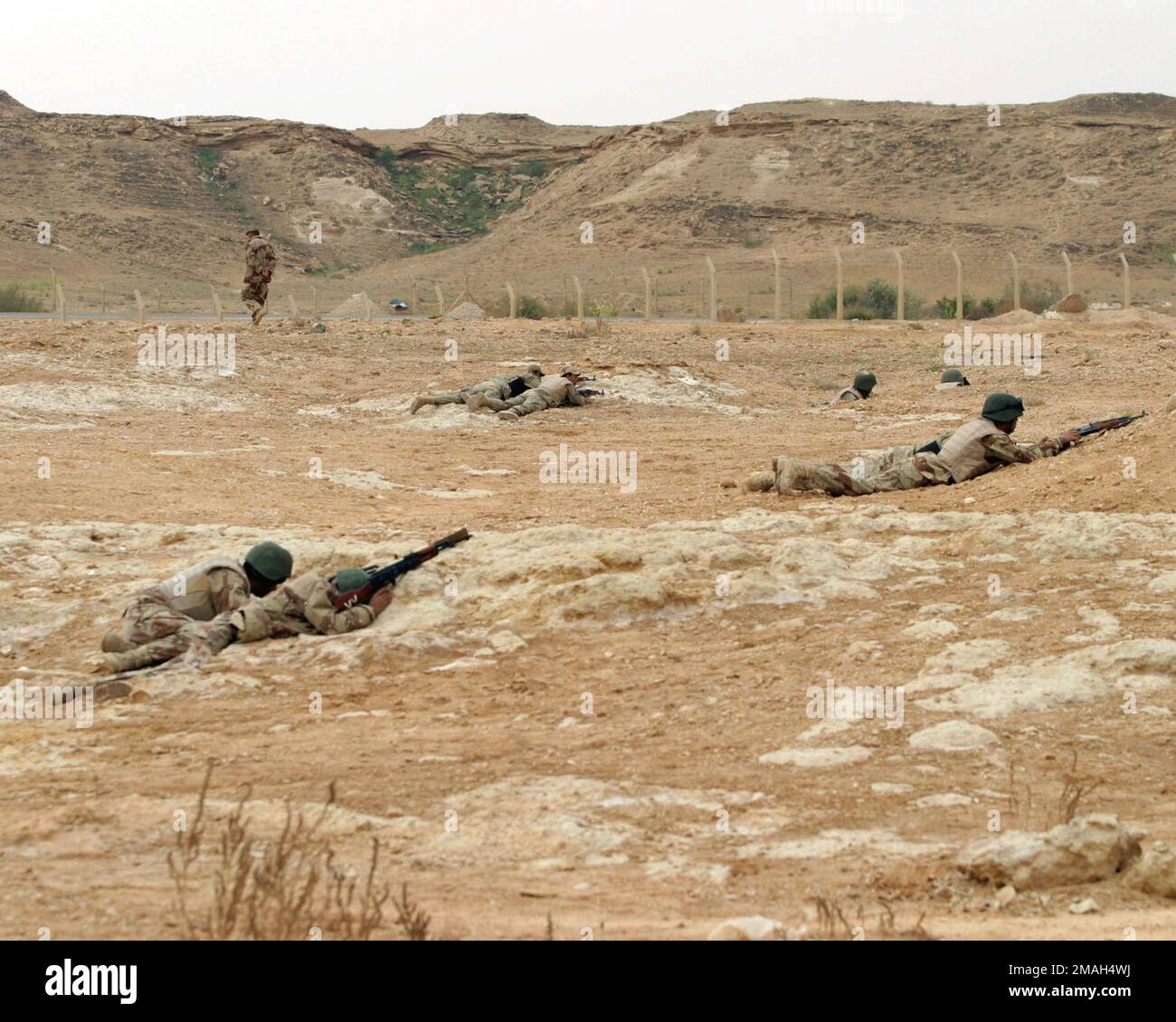 070324-M-2166H-008. [Complete] Scene Caption: Iraqi Army Soldiers in ...