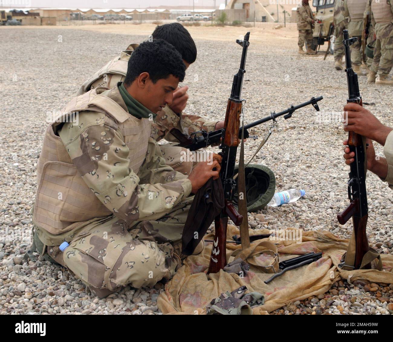 070324-M-2166H-052. [Complete] Scene Caption: Iraqi Army Soldiers in ...
