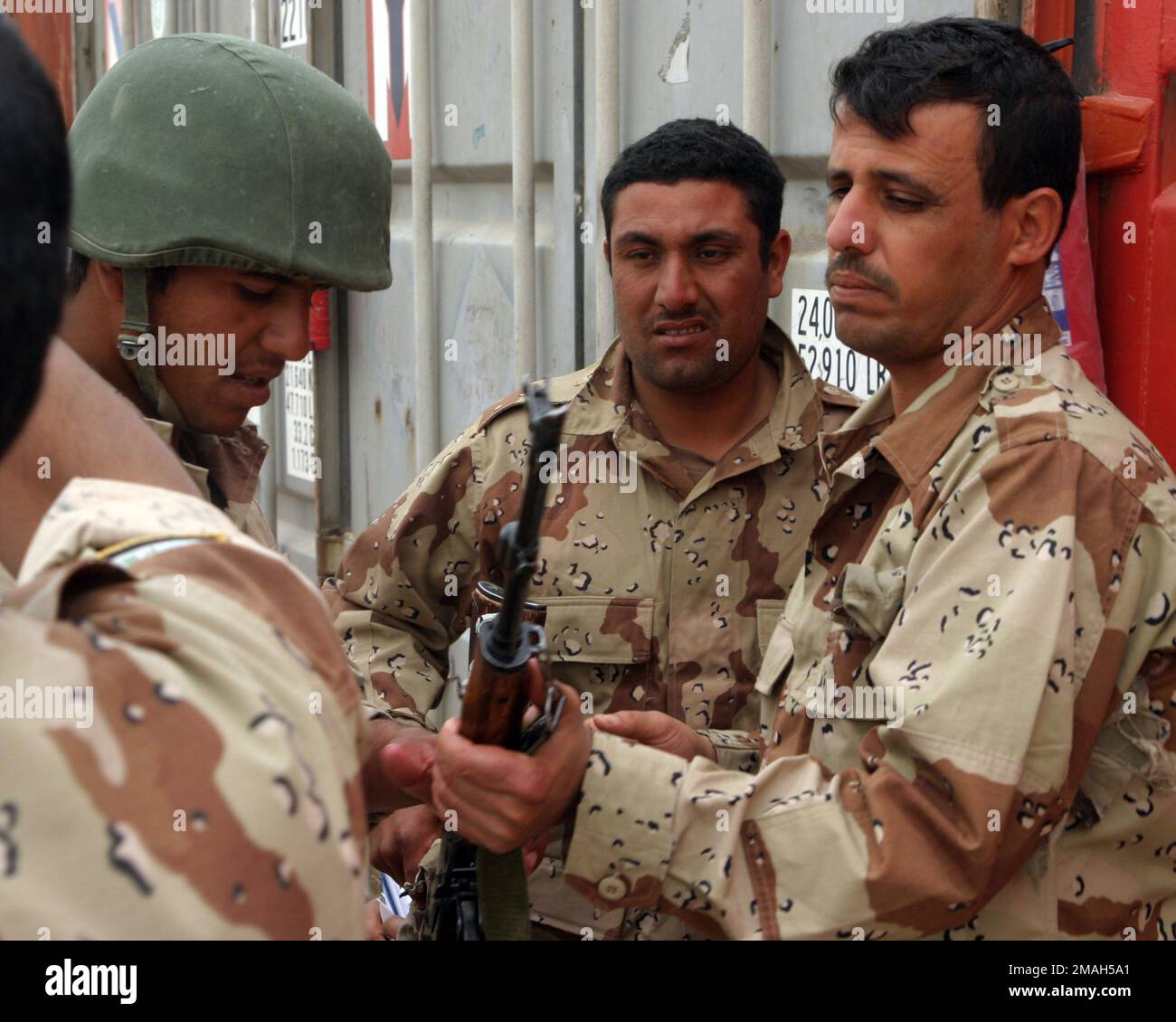 070324-M-2166H-054. [Complete] Scene Caption: An Iraqi Army Soldier ...