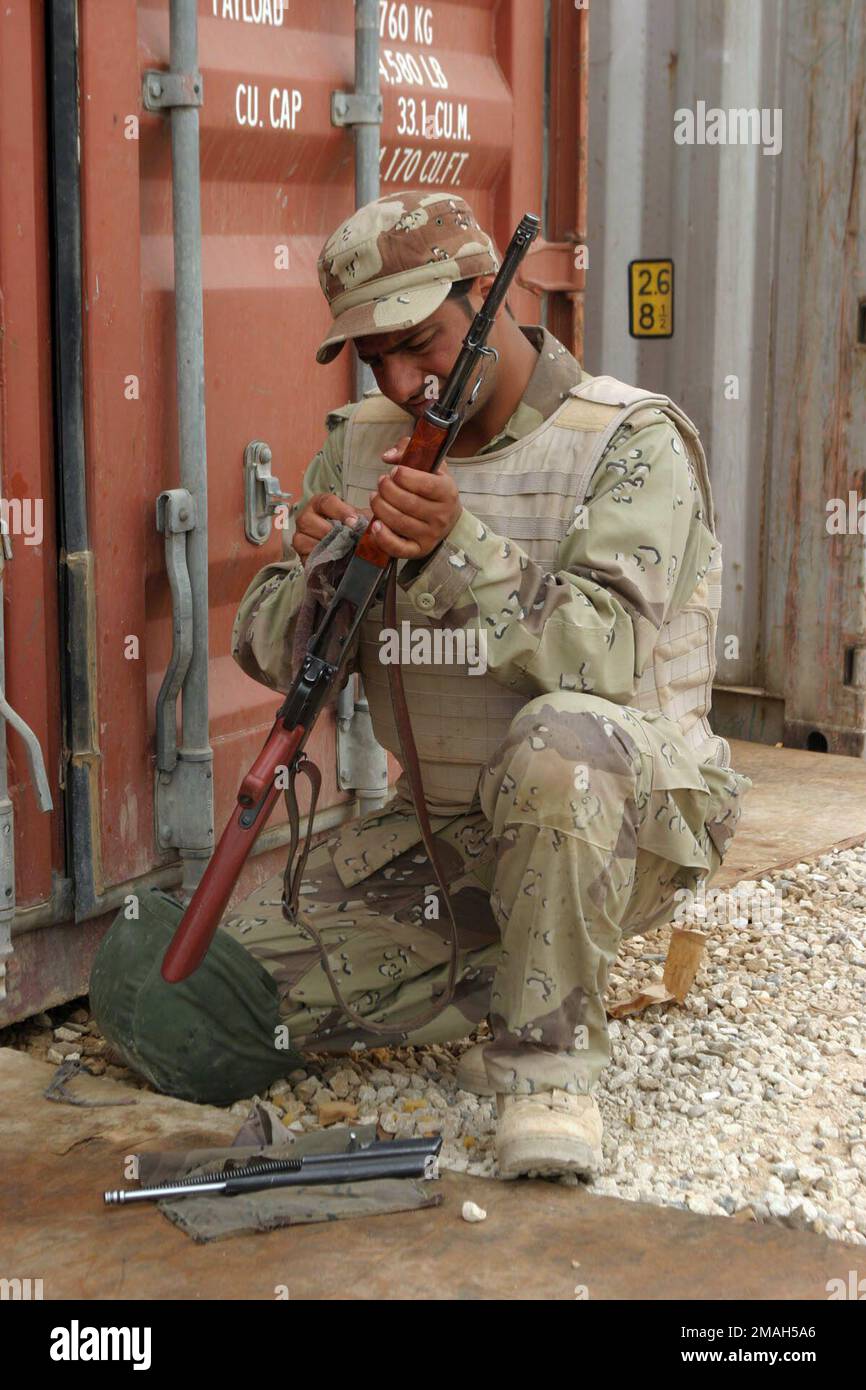 070324-M-2166H-058. [Complete] Scene Caption: An Iraqi Army Soldier in ...