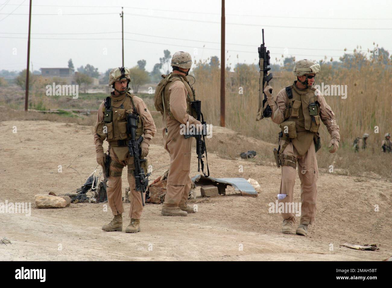 070324-M-6412C-021. [Complete] Scene Caption: U.S. Marines with 3rd ...