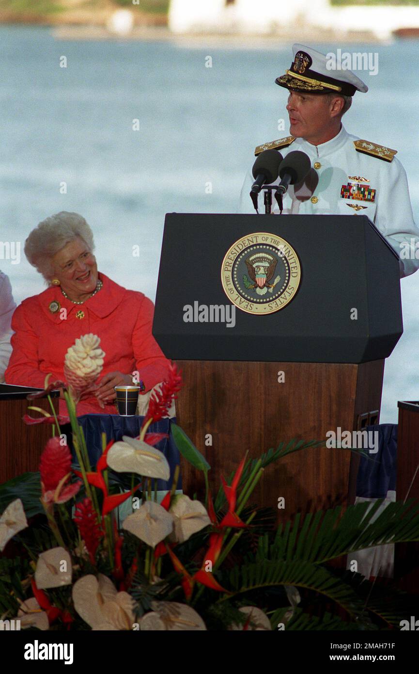 First lady, Barbara Bush smiles as ADM Charles R. Larson, Commander in ...