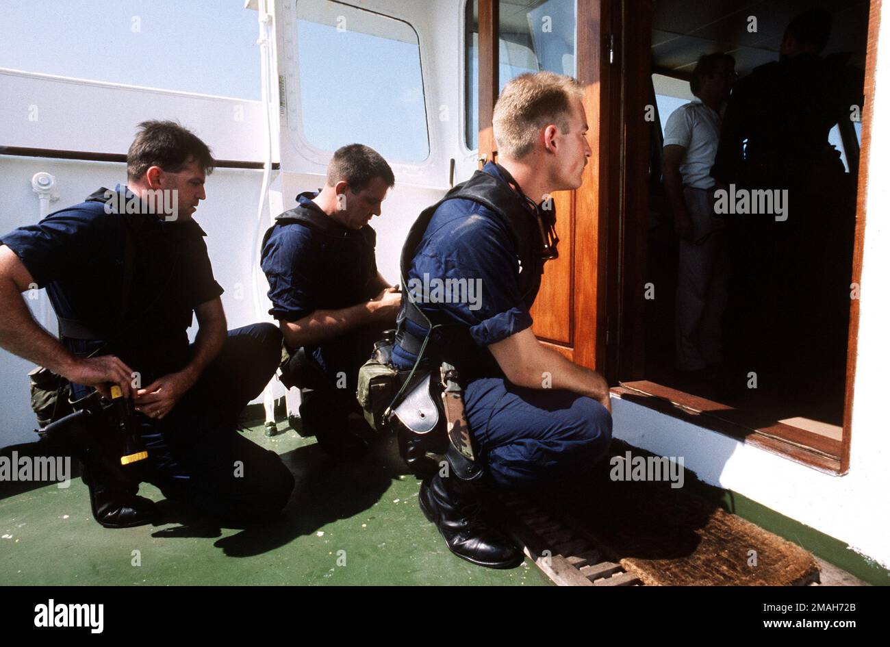 Members of the guided missile cruiser USS NORMANDY's (CG-60) Boarding ...