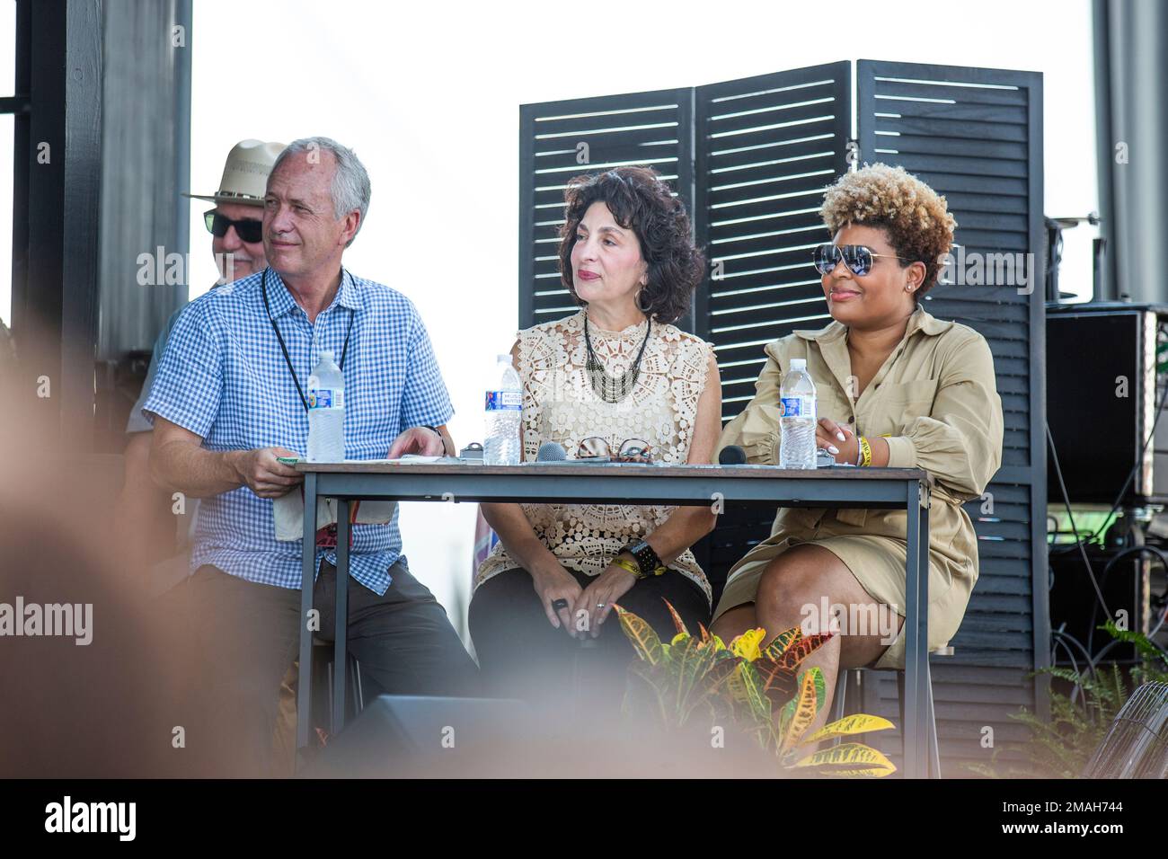 Greg Fischer, left, Peggy Noe Stevens, and Samara Davis are seen at ...