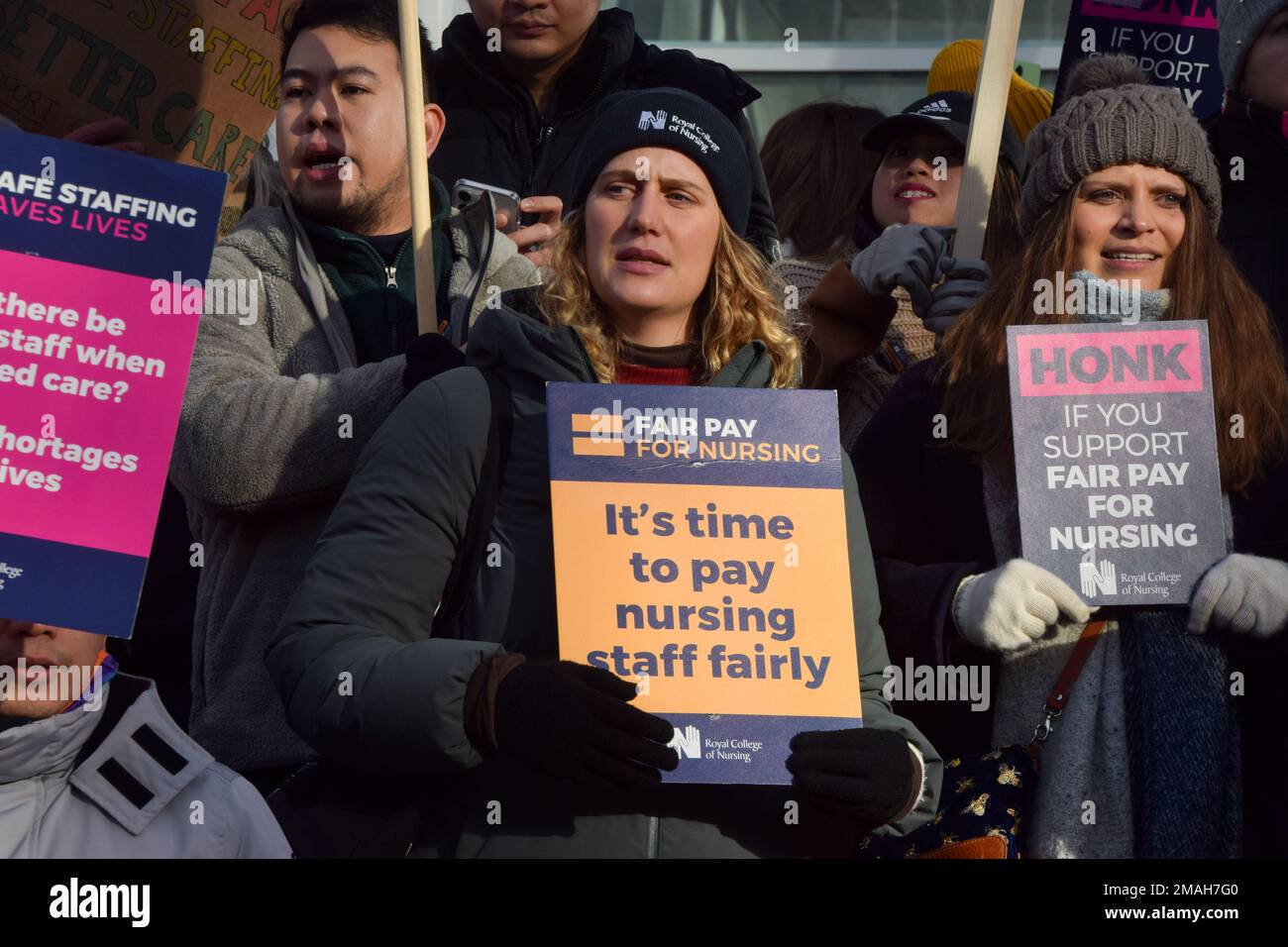 London, UK. 19th Jan, 2023. A nurse holds a placard which states 'It's ...