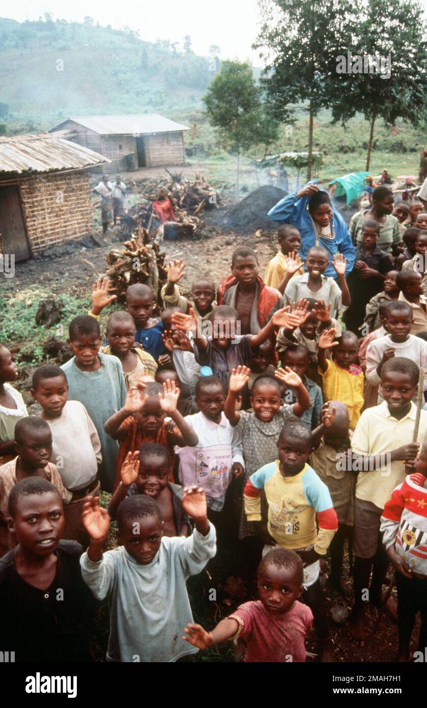 A view of the children waving in the refugee camp located near Goma ...