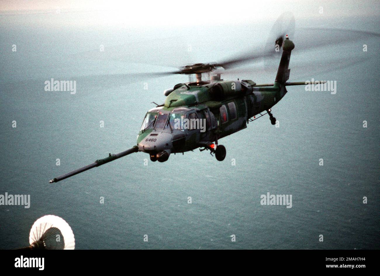 A 71st Rescue Squadron HC-130P Hercules helicopter trails a refueling ...