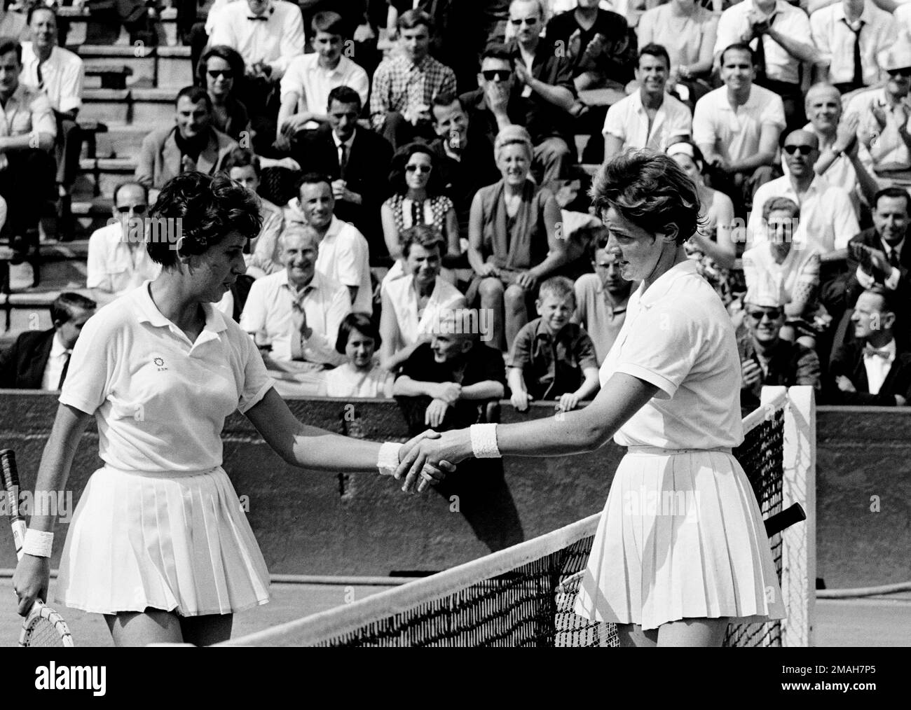 Margaret Smith (Court), right, of Australia, shakes hands with her ...