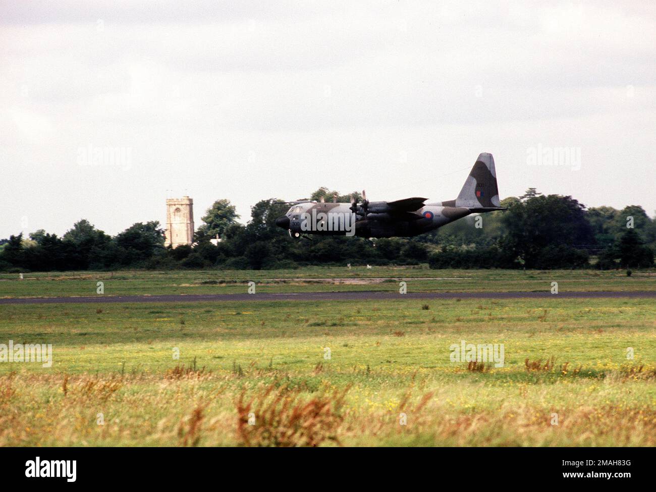 A British Hercules aircraft departs Kevill Air Field for a mission ...