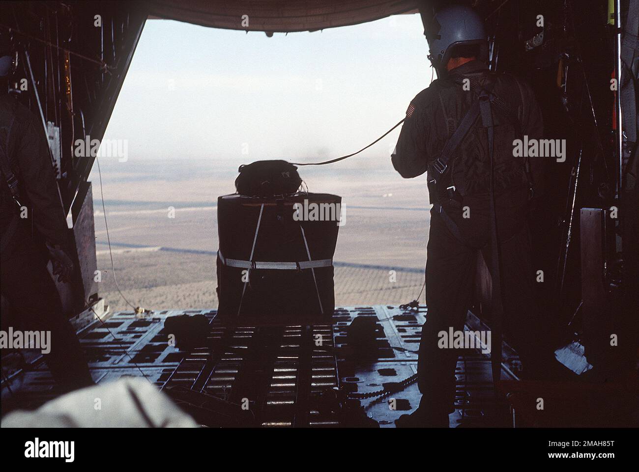 US Air Force personnel perform a heavy drop over the desert of Egypt ...