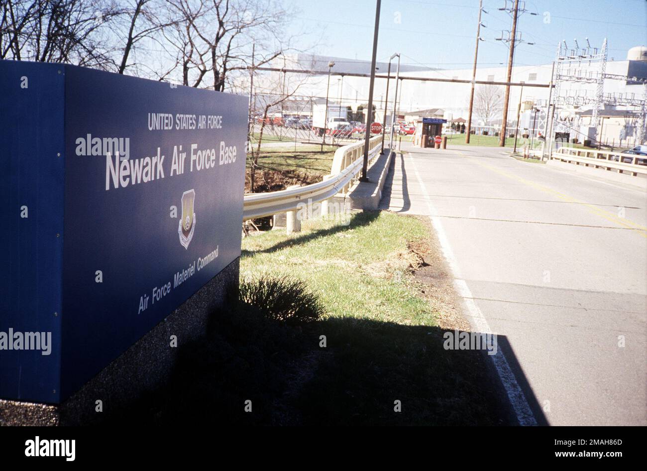 A long-range view of the main gate with the base sign in the foreground ...