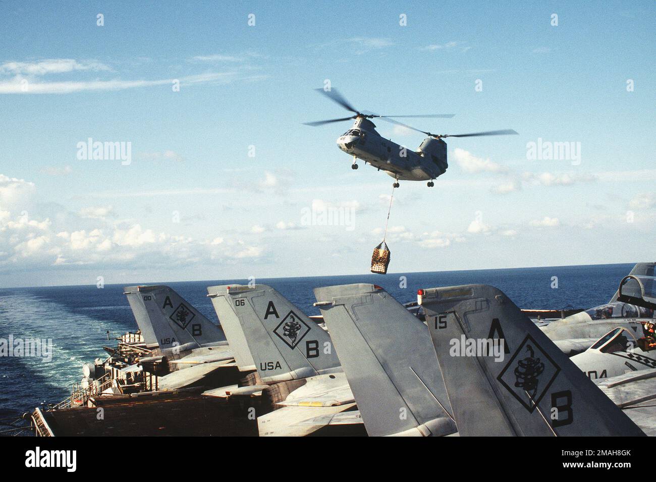 A CH-46D/E Sea Knight helicopter of Helicopter Squadron 11 (HS-11 ...