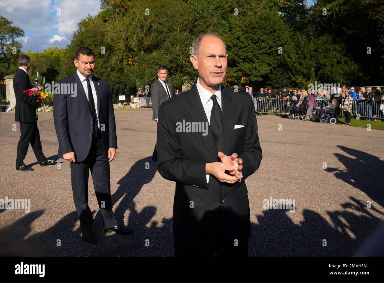 Britain's Prince Edward speaks with mourners outside the Windsor Castle ...