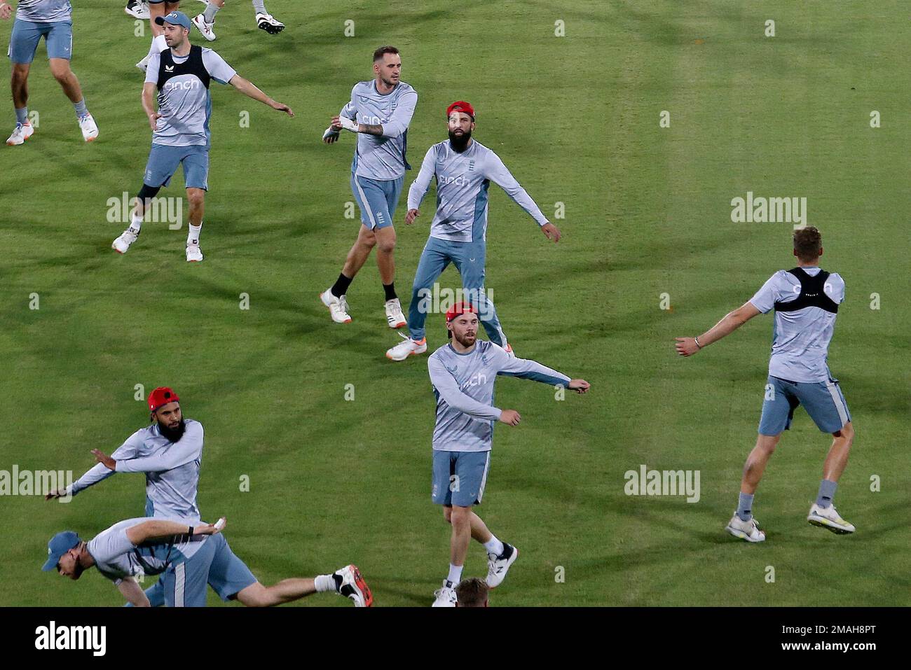 England's cricket team players warm up during a training session at the ...