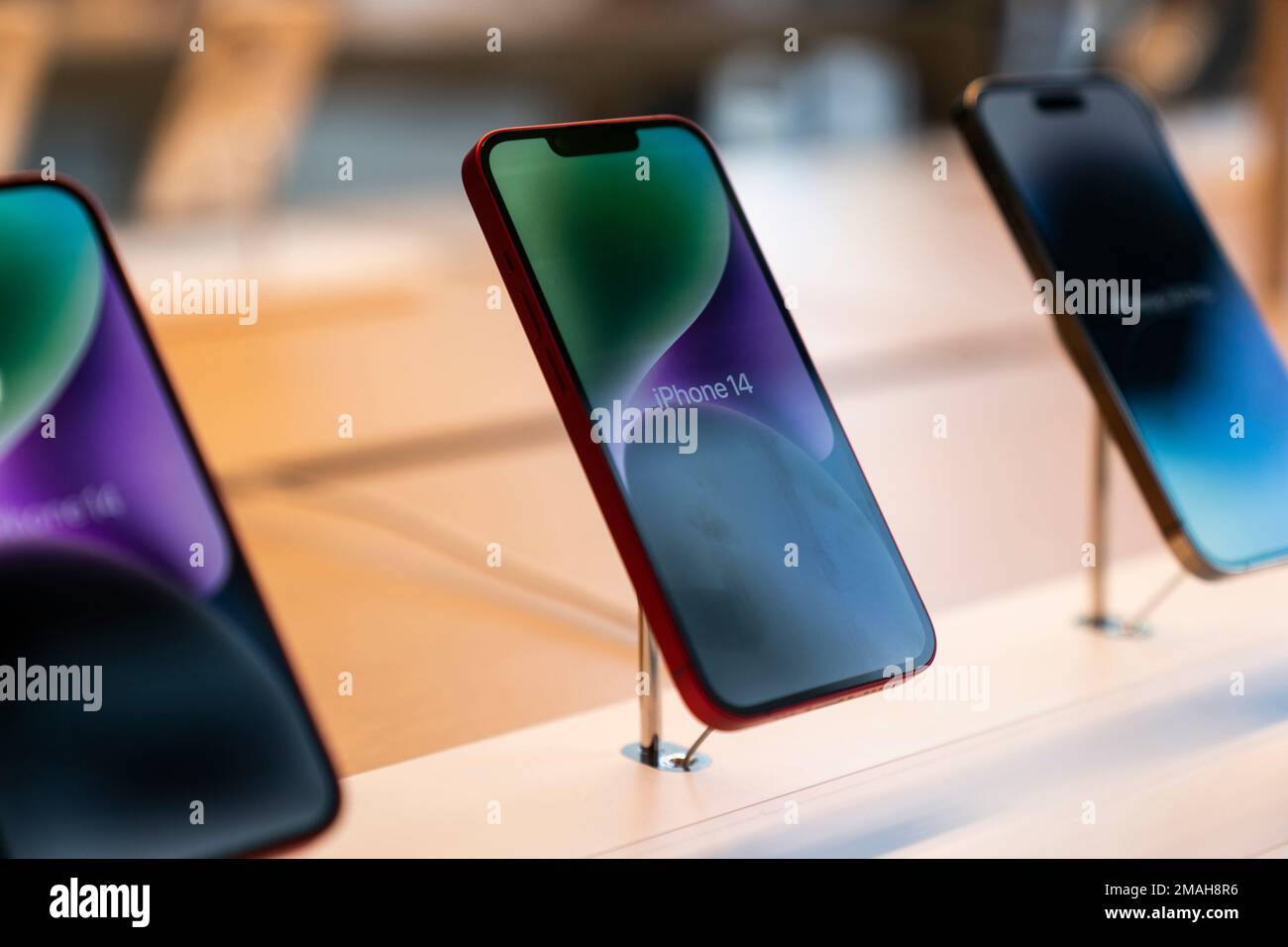 The new iPhone 14 smartphones are on display at an Apple Store at The ...
