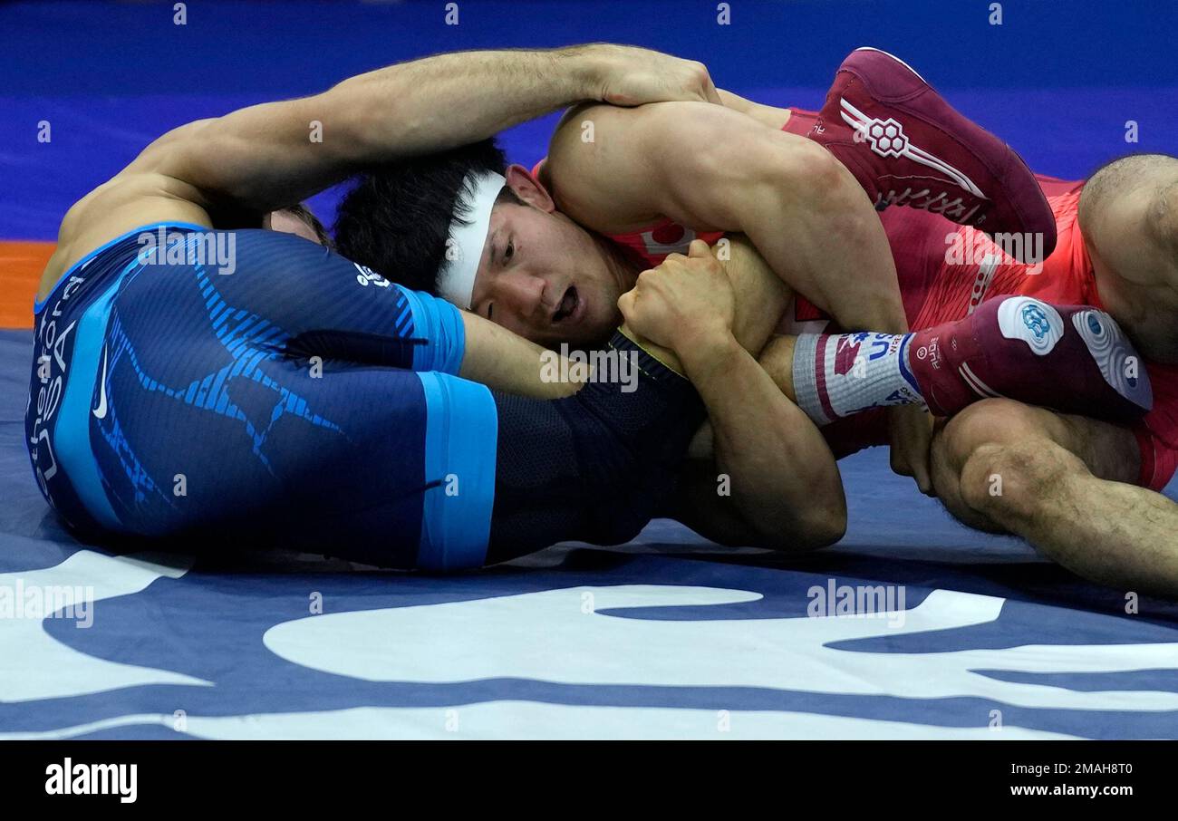 Japan's Taishi Narikuni, right, and Zain Allen Retherford of United ...