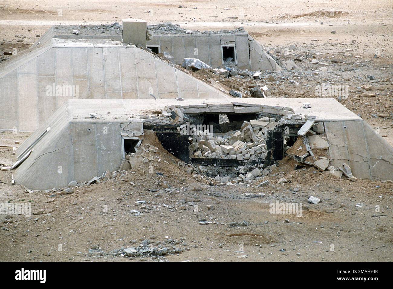 A view of a munitions bunker at Al-Salman Air Base destroyed by Allied ...